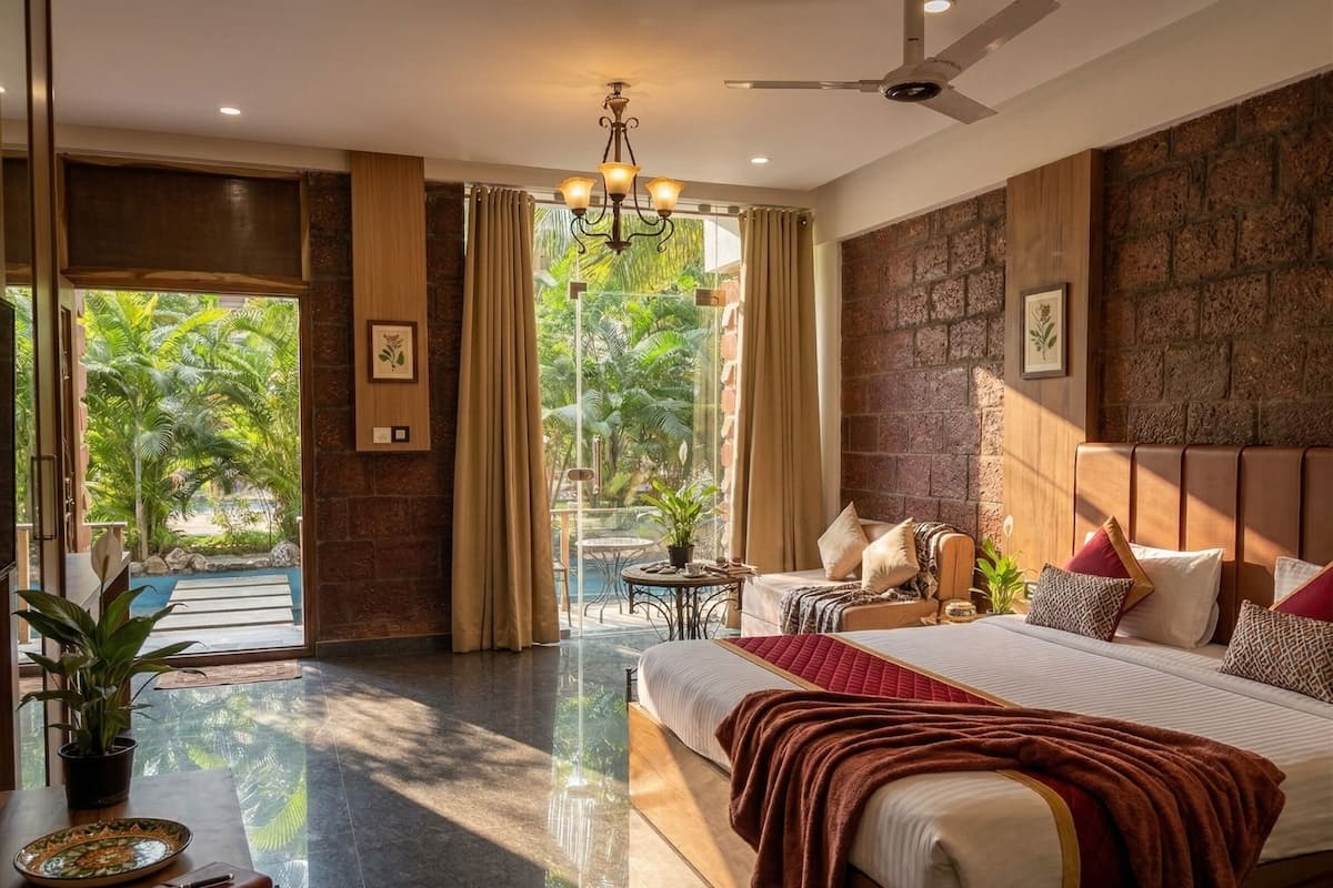 Quarto casal premium, vista para o resort | Camas extras/dobráveis (sobretaxa), Wi-Fi de cortesia, roupa de cama