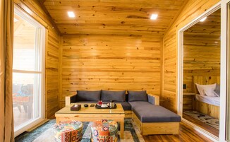 Quarto superluxo, vista para a montanha | Opções para refeição no quarto