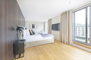 Penthouse, varanda, Vista para a cidade | 2 quartos, ferro/tábua de engomar, Wi-fi grátis