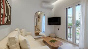 Apartamento superluxo, 2 quartos, para não fumantes, vista para a cidade | Área de estar