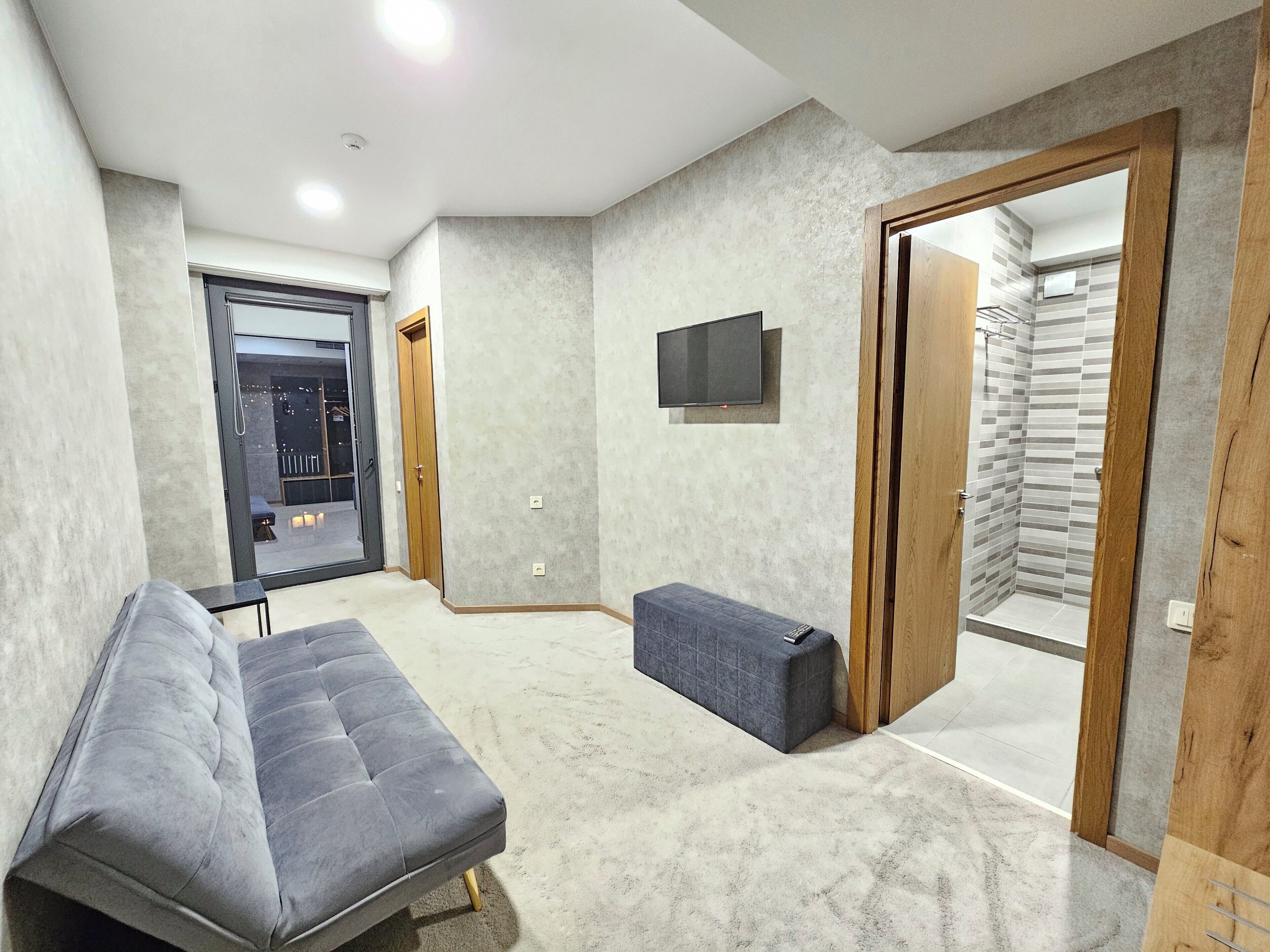 Suite Júnior, varanda | Sala | Smart TV de 36 de polegadas com canais digitais, Netflix, piso aquecido 