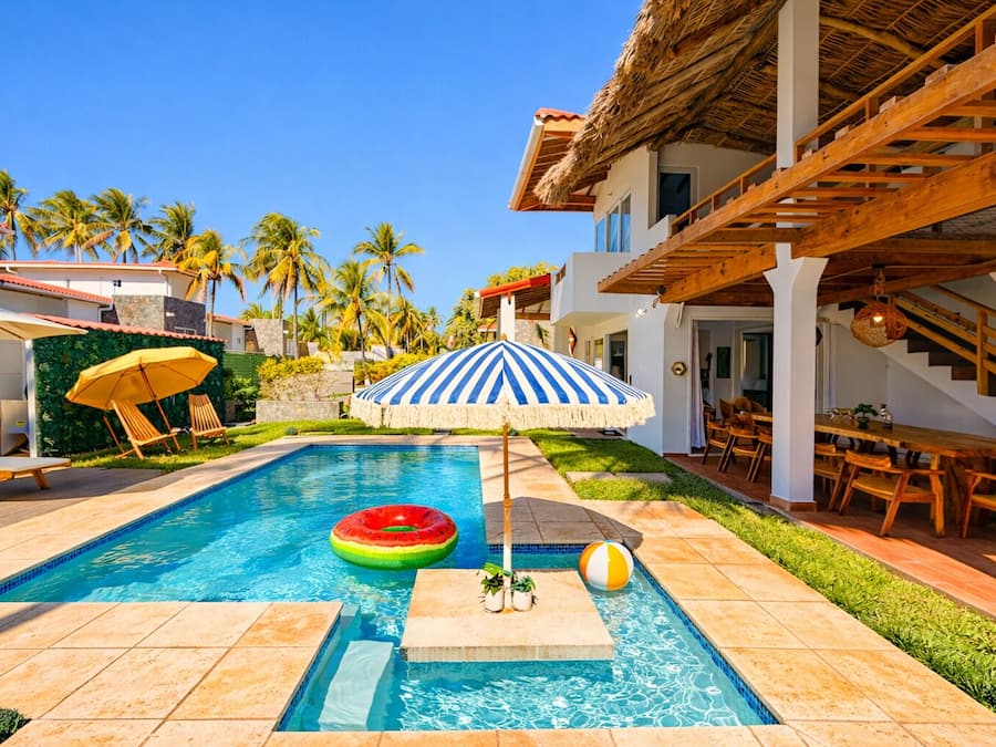 Vila família, 4 quartos, piscina particular, vista parcial para o oceano | 4 quartos, cofres nos quartos, cortinas blackout