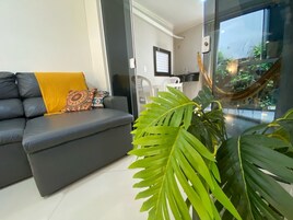 Apartamento standard | Área de estar | TV 32 polegadas com canais digitais