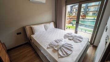 Roupas de cama premium, quartos à prova de som, Wi-Fi de cortesia