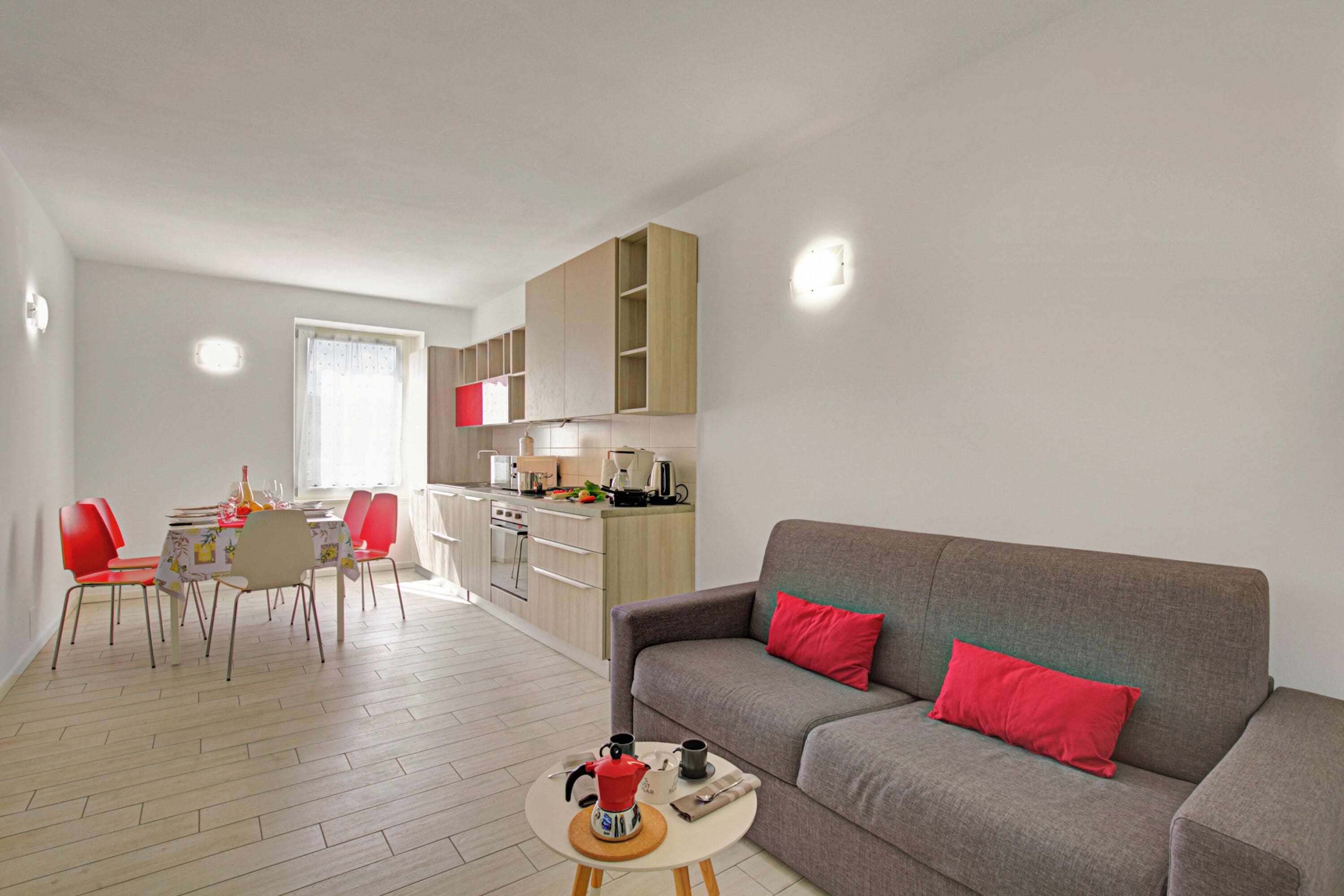 Apartamento Standard, vários quartos (Appartamento Dei Tigli) | Sala de estar | Televisor de ecrã plano de 21 polegadas com canais por cabo 