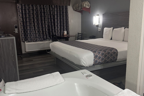 Quarto Individual de Luxo, 1 quarto | Casa de banho | Uma combinação polibã/banheira