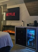 Suíte exclusiva, varanda coberta, vista para o pátio | 1 quarto, Wi-Fi de cortesia