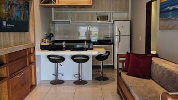 Apartamento Deluxe, vista para o jardim | Cozinha privada | Uma máquina de café expresso