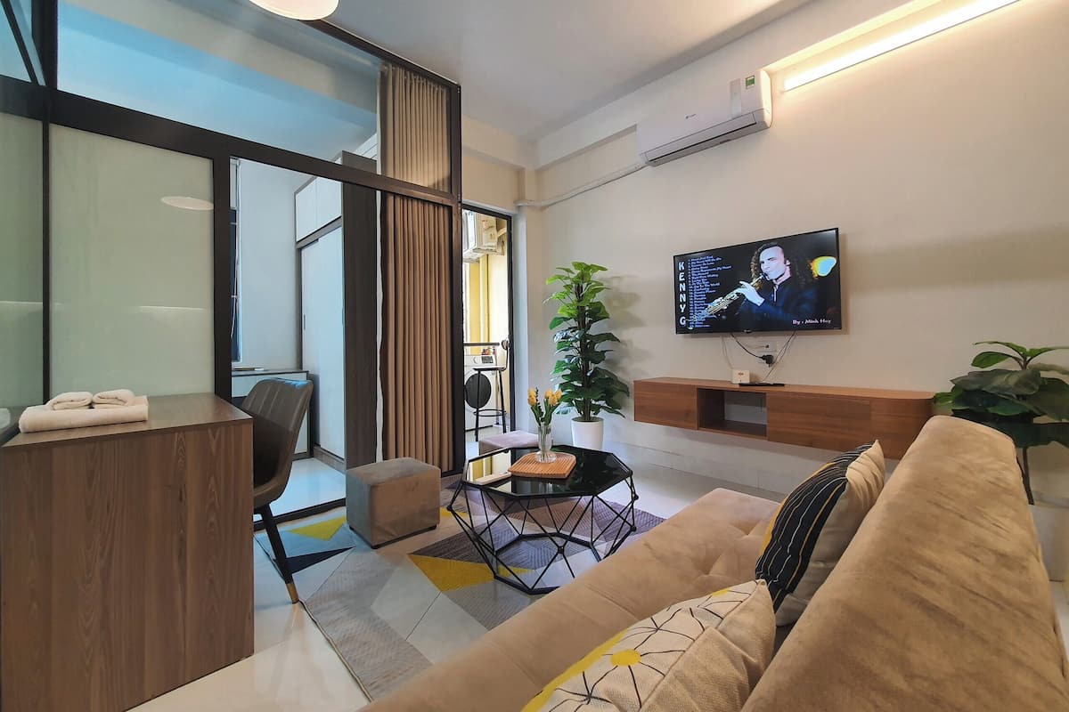 Apartamento Deluxe, 2 quartos, cozinha | Secretária, ferro/tábua de engomar, Wi-fi grátis