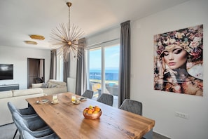 Cobertura superluxo, vista para o mar | Sala de jantar