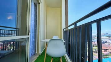 Apartamento superior | Terraço/pátio