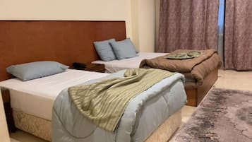 Quarto triplo superior | Wi-Fi de cortesia, roupa de cama