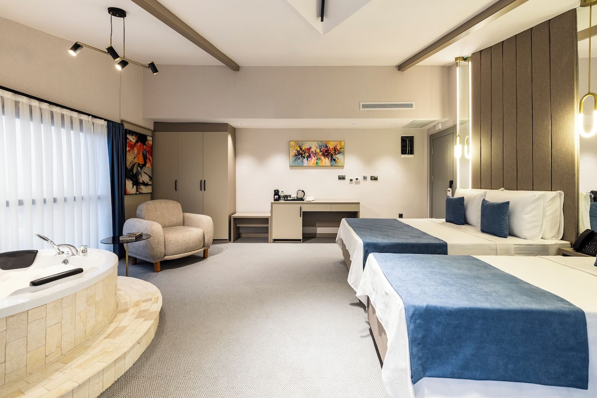 Quarto Deluxe | 1 quarto, cofre com capacidade para portátil, secretária
