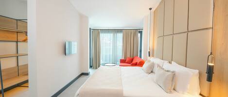 Suite-Estúdio Deluxe | Secretária, quartos insonorizados, Wi-fi grátis