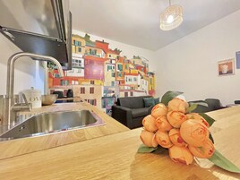 Apartamento família | Cozinha privada | Cadeirão de bebê