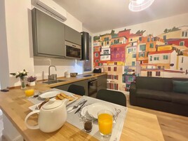 Apartamento família | Cozinha privada | Cadeirão de bebê