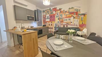 Apartamento família | Cozinha privada | Cadeirão de bebê