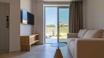 Duplex superior, vista para a piscina | Área de estar