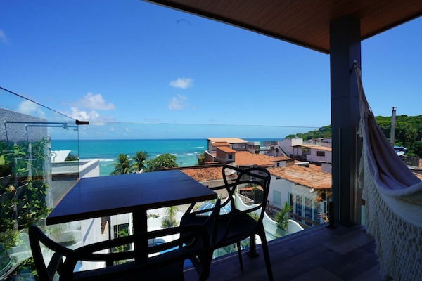 Suíte premium, vista para o mar | Terraço/pátio