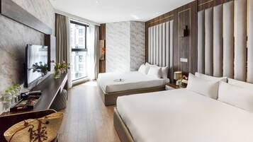 Quarto quádruplo executivo, vista para o jardim | Camas com colchões pillow-top, frigobar, cofres nos quartos