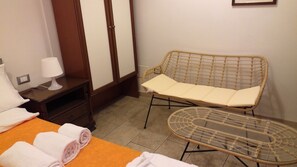 Quarto Quádruplo Clássico | Minibar, Wi-fi grátis 