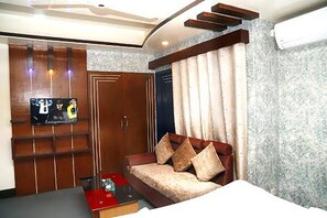 Quarto Duplo Deluxe | Sala de estar