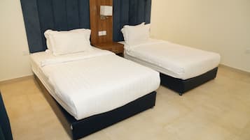 Apartamento Básico | 1 quarto, cortinas/cortinados opacos, ferro/tábua de engomar