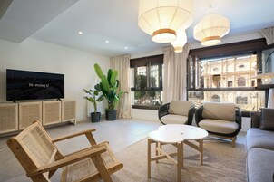 Apartamento exclusivo, cozinha, vista para a cidade | Área de estar