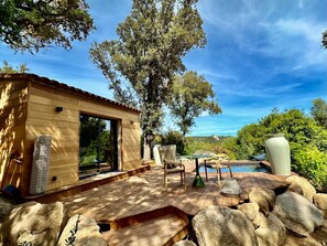 Quarto Deluxe, pátio, vista para o jardim | Terraço/pátio interior