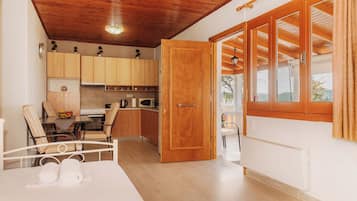 Casa Comfort, vista para o mar | Sala de estar | TV de ecrã plano