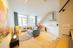 Apartamento, 2 quartos | Área de estar