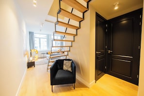 Apartamento, 2 quartos | Área de estar