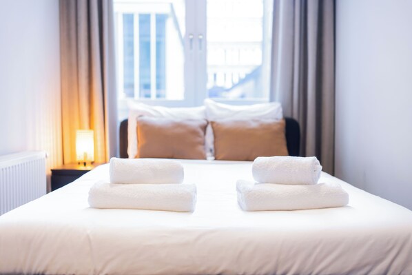 Apartamento, 3 quartos | Área de estar