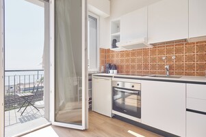 Apartamento (0 Bedroom) | Cozinha americana privada | Fogão, máquina de café expresso, chaleira elétrica