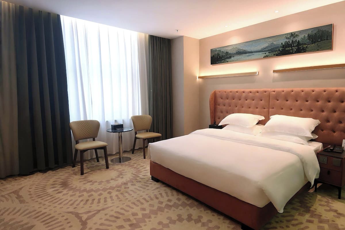 Quarto casal superior | Roupas de cama premium, edredons de pluma, individualmente decorados