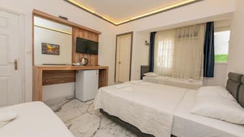 Quarto quádruplo básico, sacada | Vista do quarto