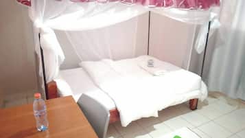Quarto casal luxo, vista para a cidade | Wi-Fi de cortesia, roupa de cama