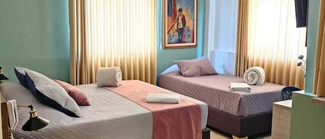 Quarto Triplo | Ferro/tábua de engomar, Wi-fi grátis, roupa de cama fornecida