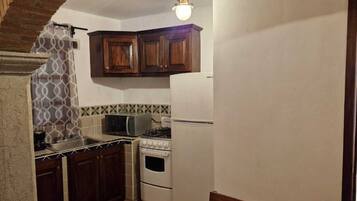 Apartamento Comfort, vista para o pátio | Cozinha privada