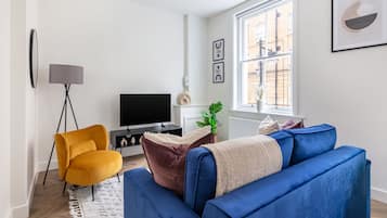 Apartamento Cidade, 1 quarto, não fumadores | Sala de estar | Smart TV de 40 polegadas com canais via satélite