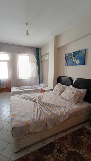 Minibar, secretária, quartos insonorizados, ferro/tábua de engomar 