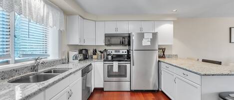 Casa de Férias, 2 quartos | Cozinha privada | Um frigorífico, um forno, uma cafeteira/bule, uma torradeira