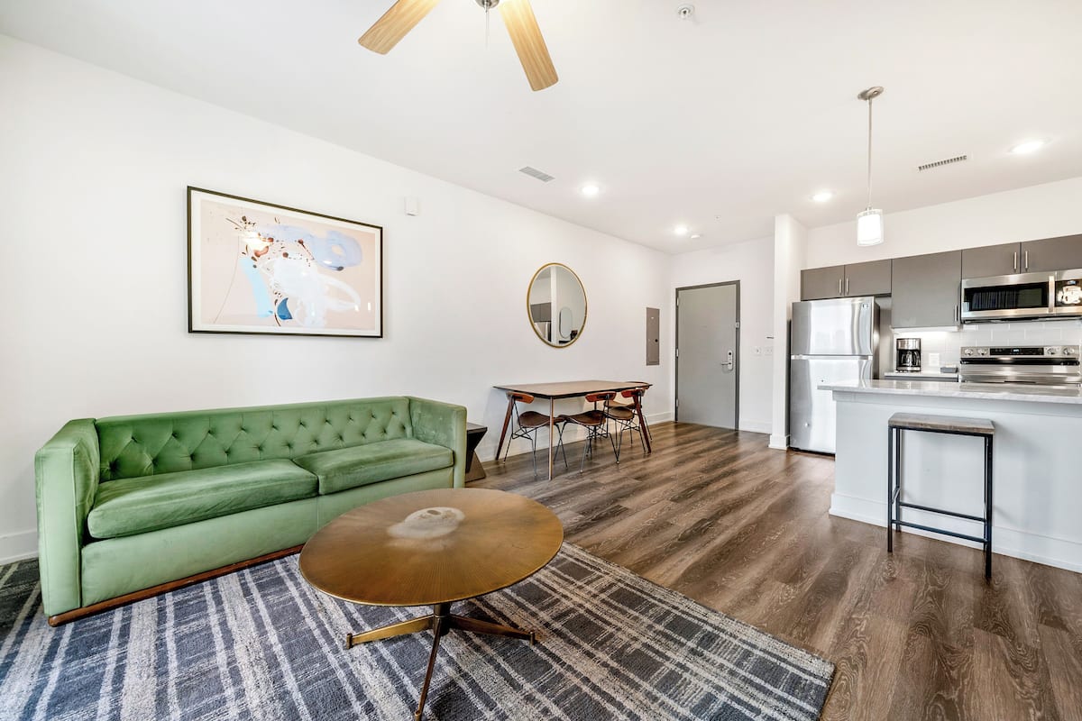 Apartamento superior, 2 quartos | Área de estar