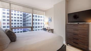 Apartamento Deluxe, cozinha | 1 quarto, secretária, secretária adequada para computadores portáteis