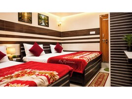 Quarto Quádruplo Deluxe, ar condicionado | Vista do quarto
