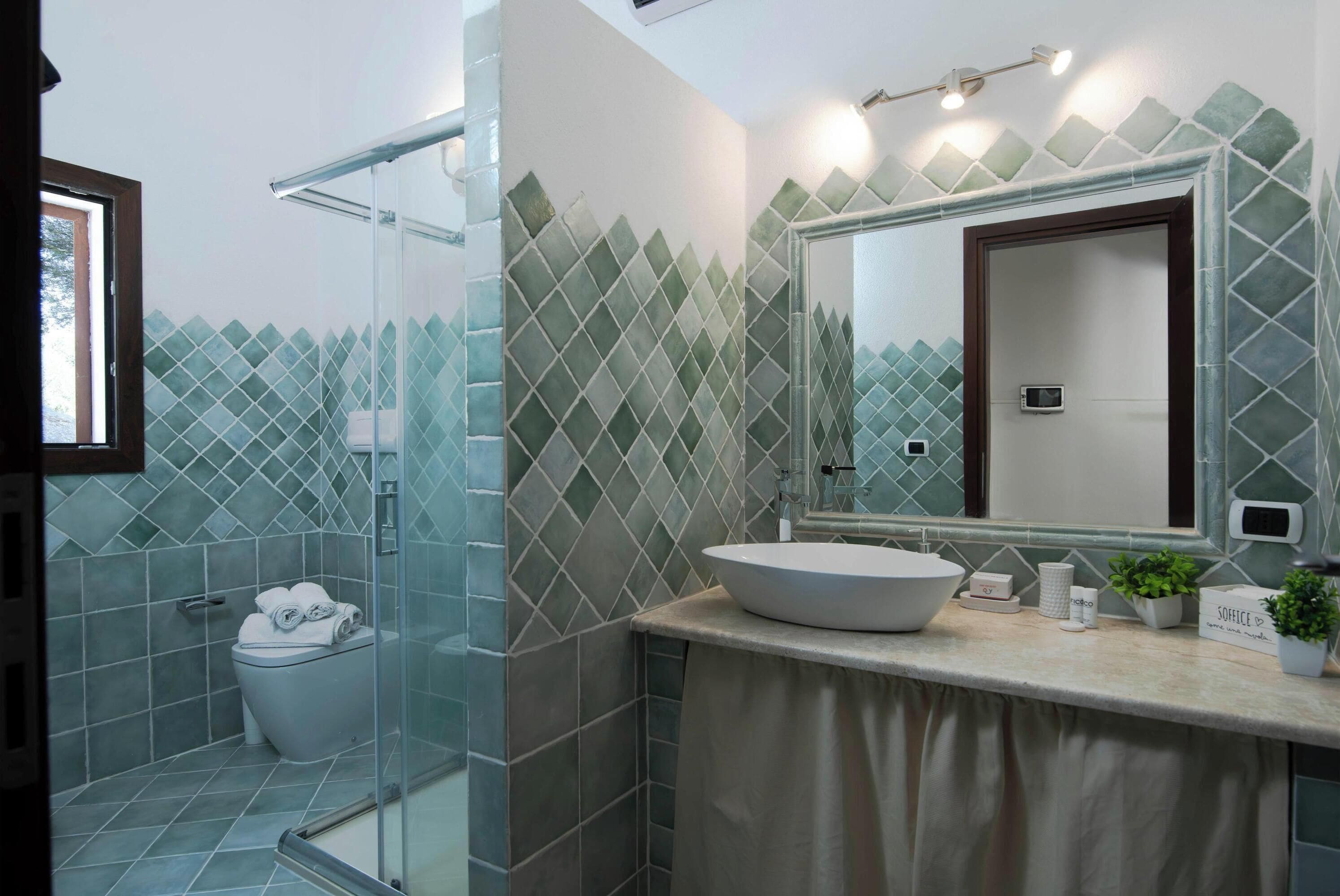 Apartamento família, vários quartos, 2 banheiros (La Suara Manna) | Banheiro | Chuveiro/banheira combinados, secador de cabelo, bidê, toalhas de banho