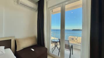 Apartamento conforto, sacada, vista para o mar | Vista do quarto