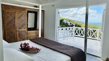 Quarto Duplo Deluxe, vista para o mar | Minibar, roupa de cama fornecida