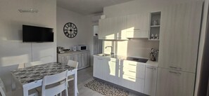 Apartamento, 2 quartos, fumadores, pátio | Sala de jantar