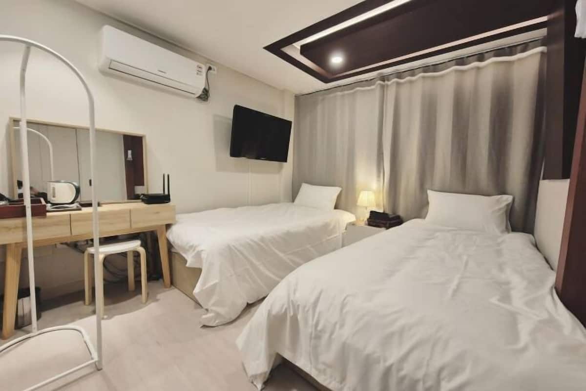 Wi-Fi de cortesia, roupa de cama